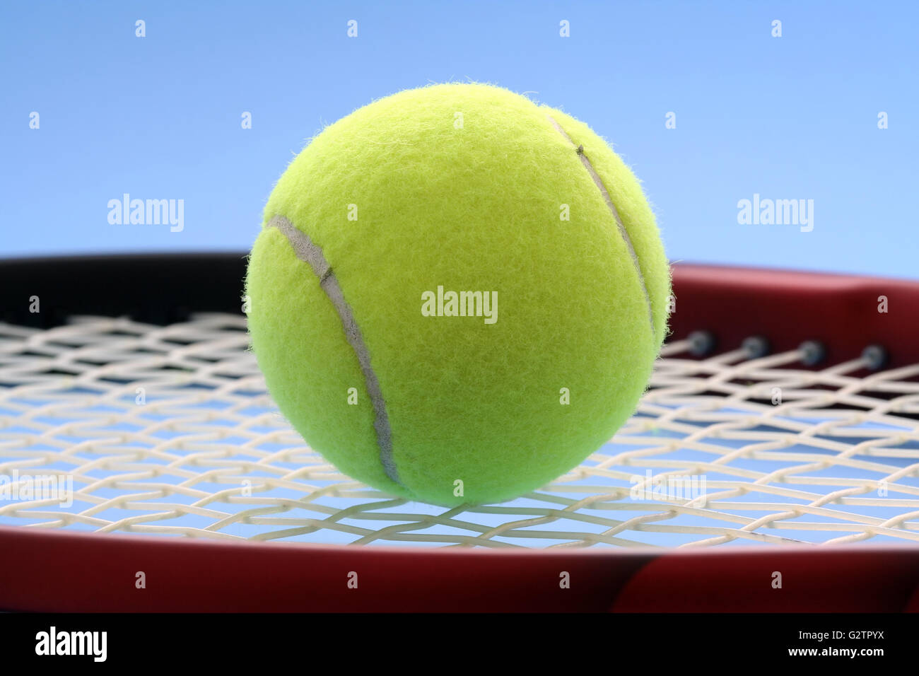 Tennis ball and tennis racquet Stock Photo - Alamy