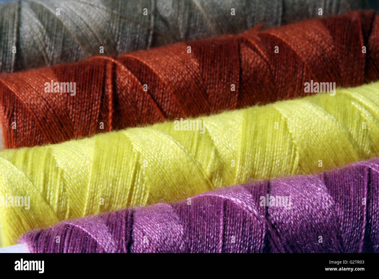 Close up image of colorful threads Stock Photo - Alamy