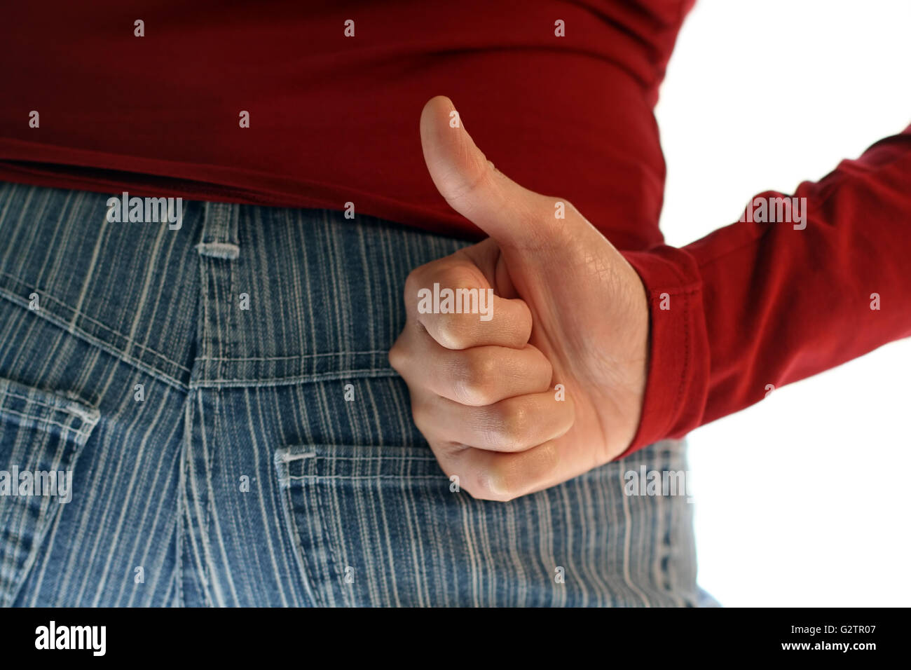 A woman with thumb up sign Stock Photo - Alamy