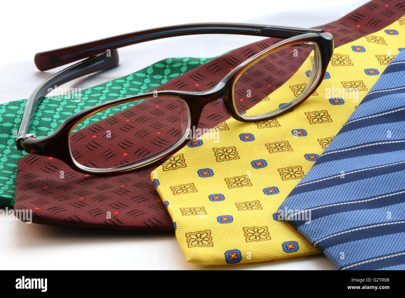 Row of ties and glasses Stock Photo - Alamy