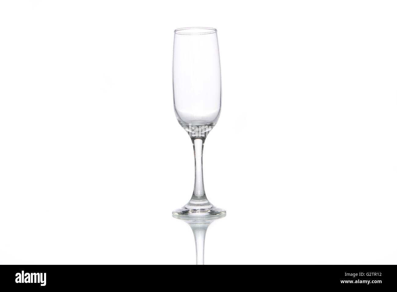 empty champagne glass on white background Stock Photo - Alamy