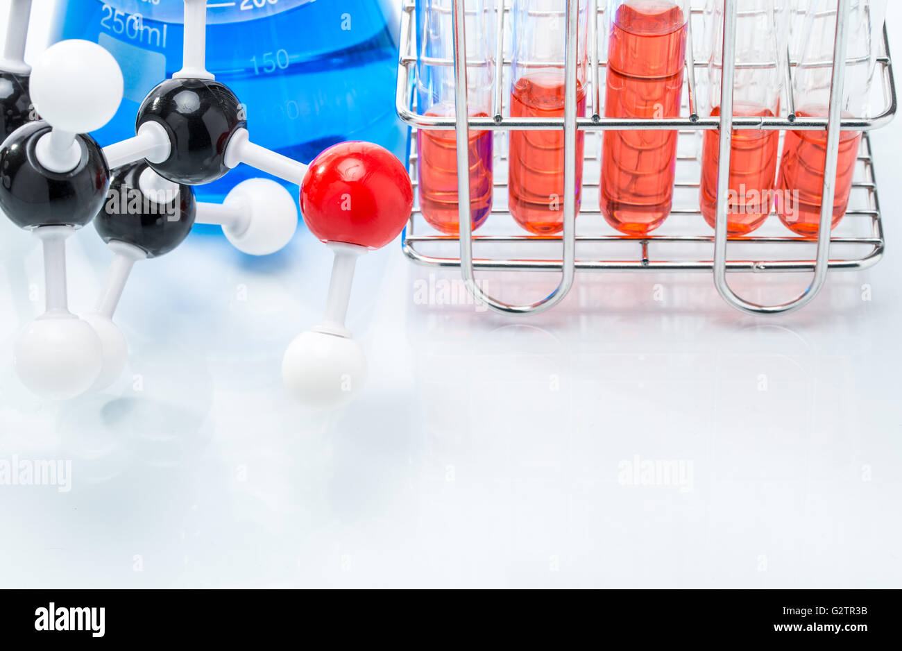 Molecular Structure and colorful liquid on white background Stock Photo ...