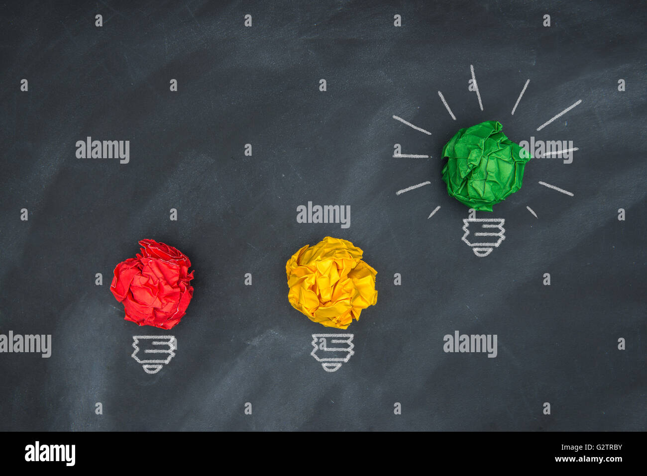 Global economic bright green light, colorful Paper Ball on Blackboard ...