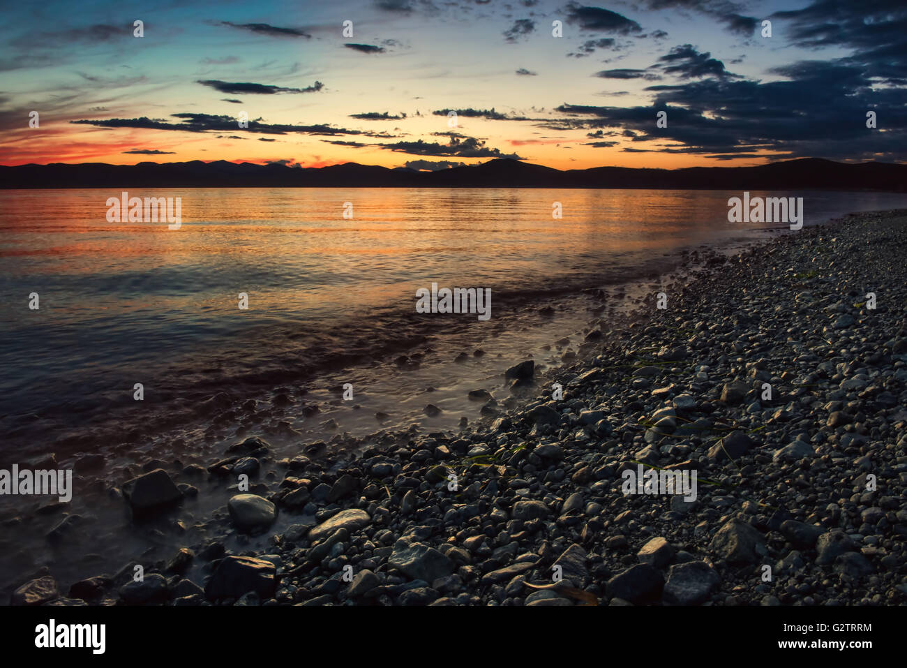 Beautiful orange sunset on pacific ocean hi-res stock photography and images - Alamy