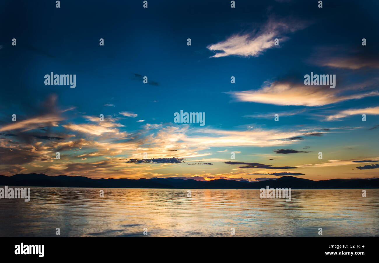 Beautiful sunset on pacific ocean Stock Photo - Alamy