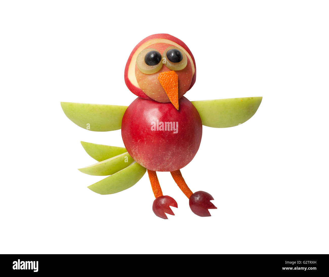 Flying bird made of apple on white background Stock Photo - Alamy