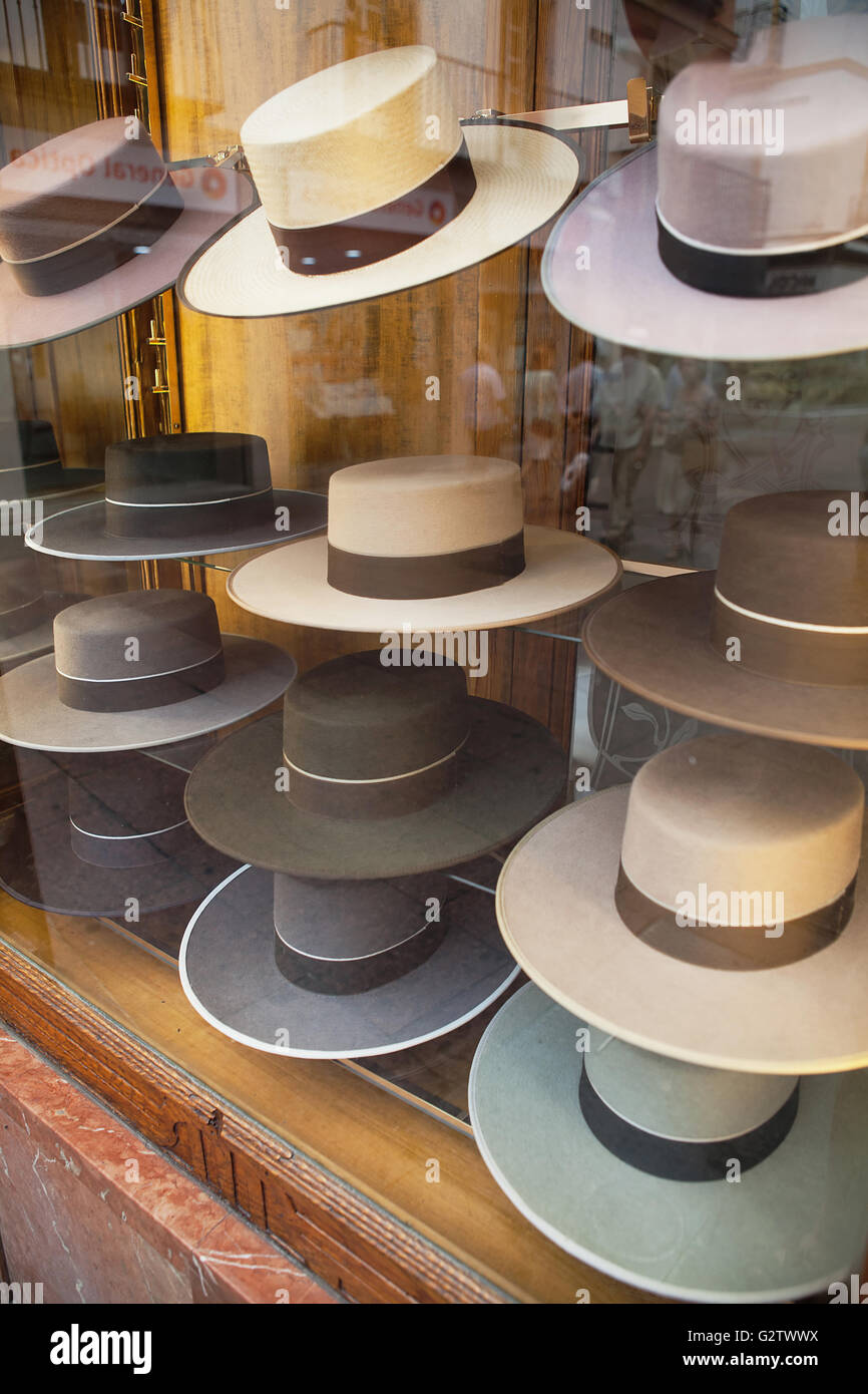 Spain, Andalucia, Seville, Sevillano Hats on display in the shop window ...