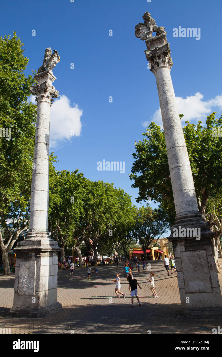 Spain, Andalucia, Seville, Roman columns with statues of lions at the ...