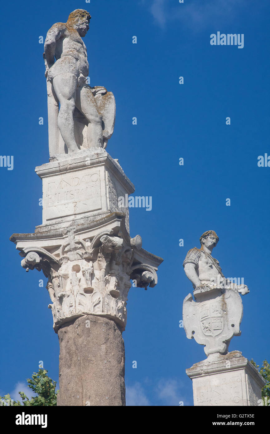 Spain, Andalucia, Seville, Statues of Hercules and Caesar on the Roman ...
