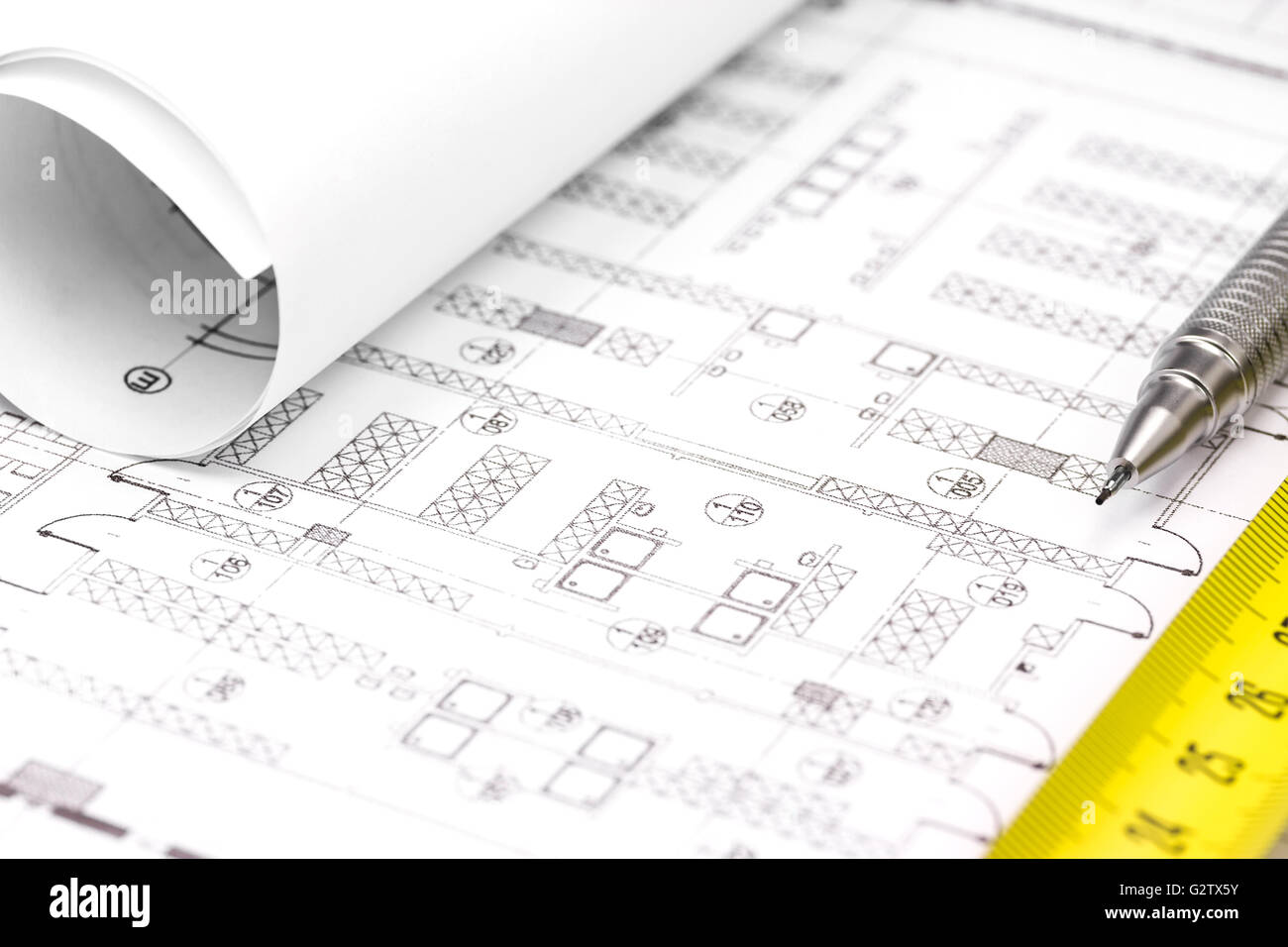 Home building construction plans with yellow measuring tape Stock Photo ...