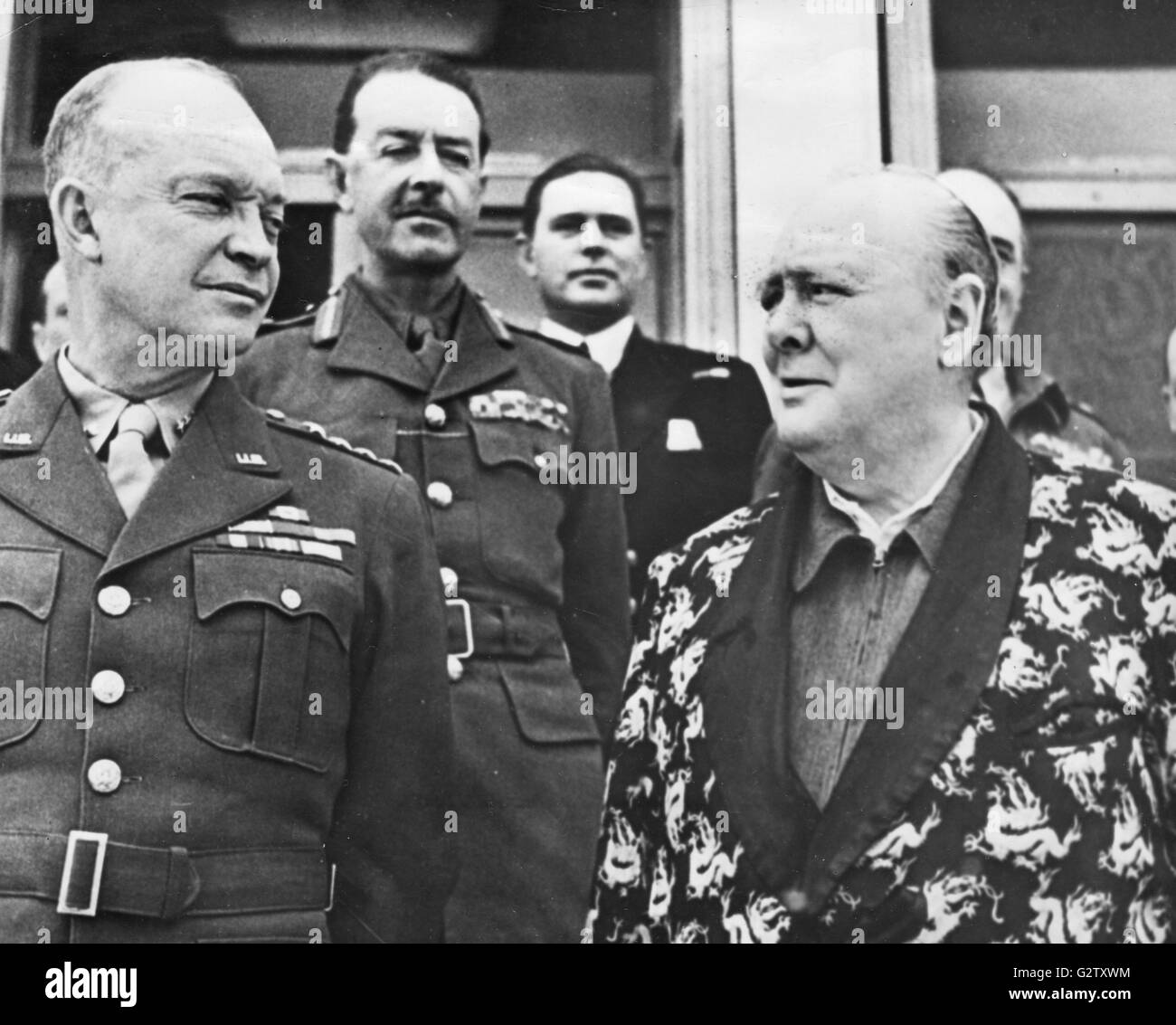 British Prime Minister Winston Churchill (right), wearing his famous ...