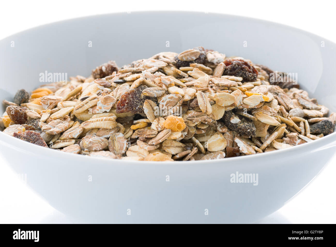 Close up of ready to use muesli on white background Stock Photo - Alamy