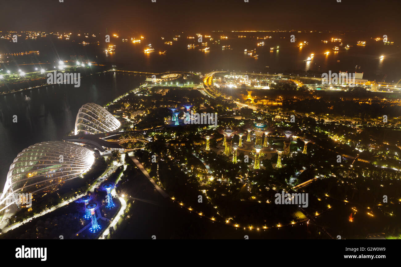 Aerial night view of The Supertree Grove at Gardens near Marina Bay ...