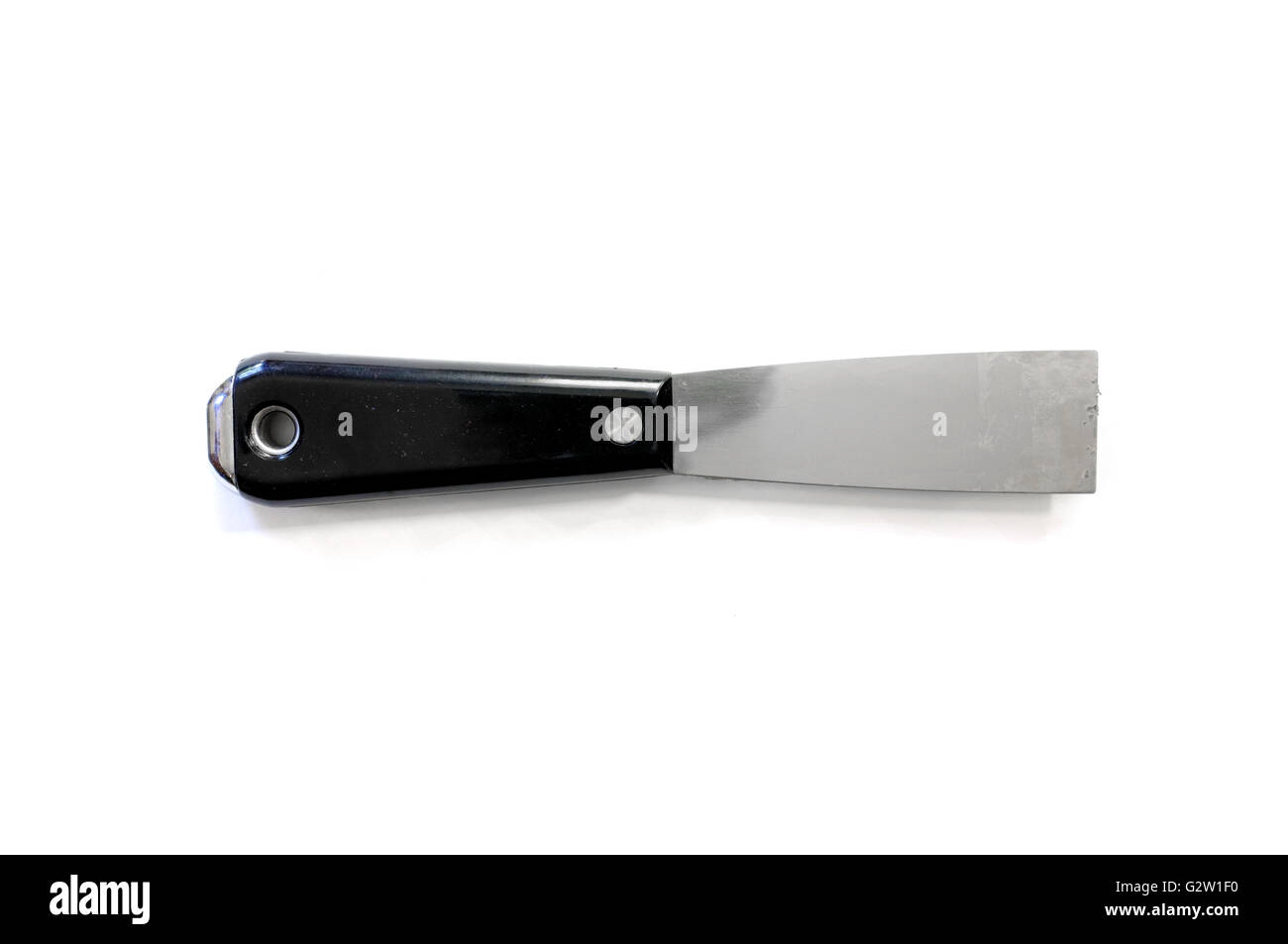 A scraper photographed against a white background Stock Photo - Alamy