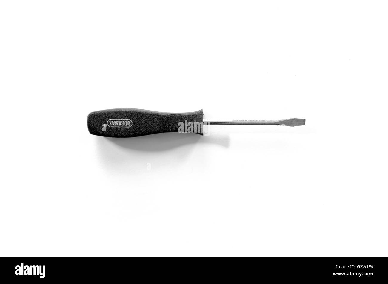 A flat headed screwdriver photographed against a white background Stock ...