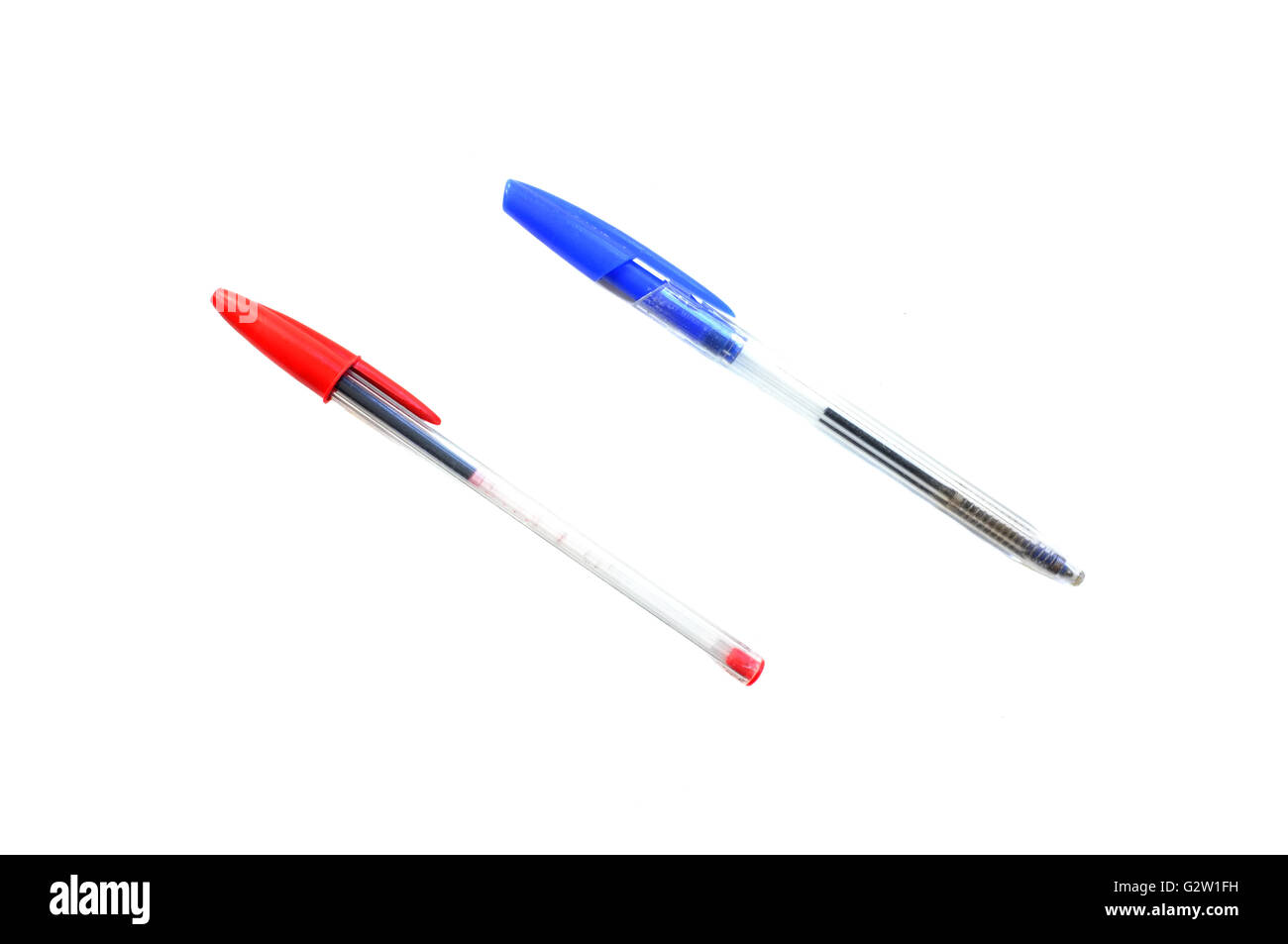 Red and Blue pens photographed against a white background Stock Photo ...