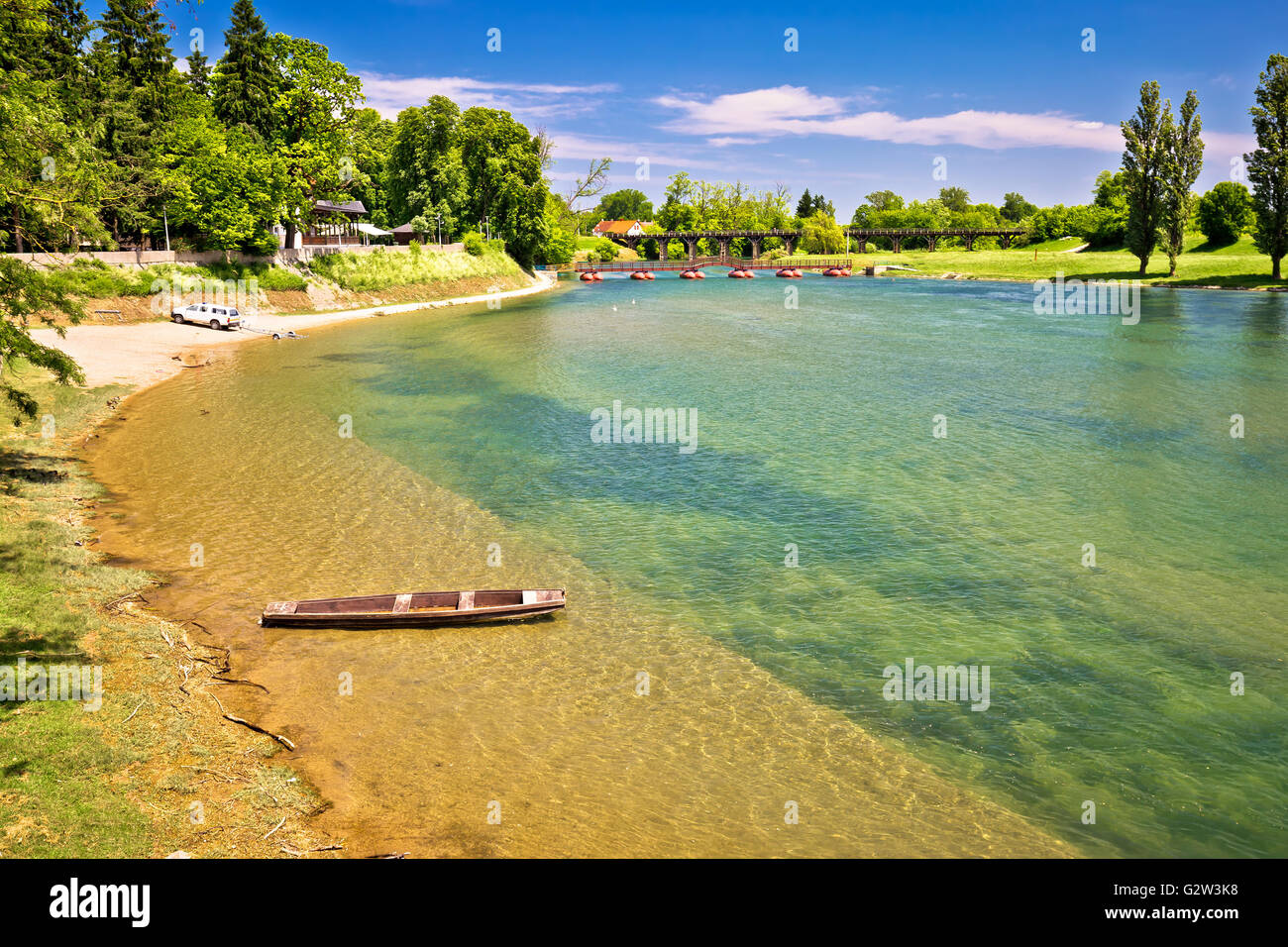 Korana river beach and wooden boat, town of Karlovac, Croatia Stock ...