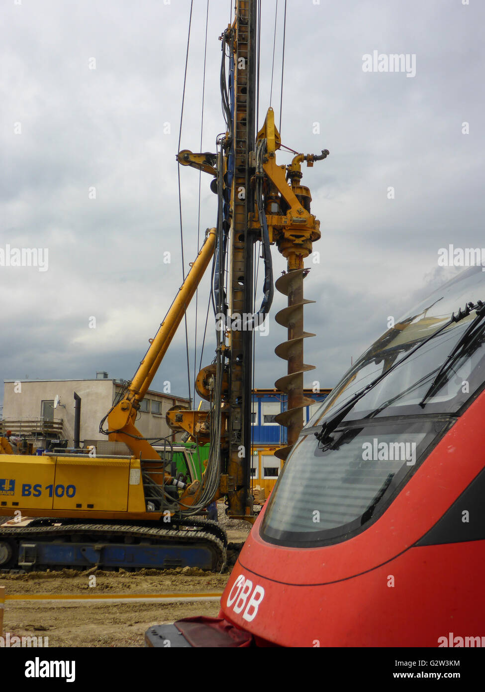railway line Construction site of the ÖBB with auger pile driller and ...