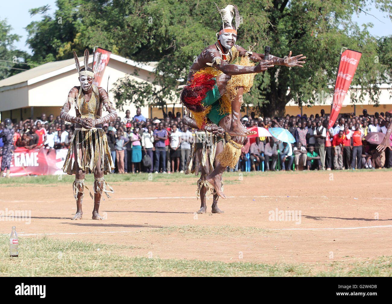 Traditional dancers entertain guests in Uganda. Music and dance are ...
