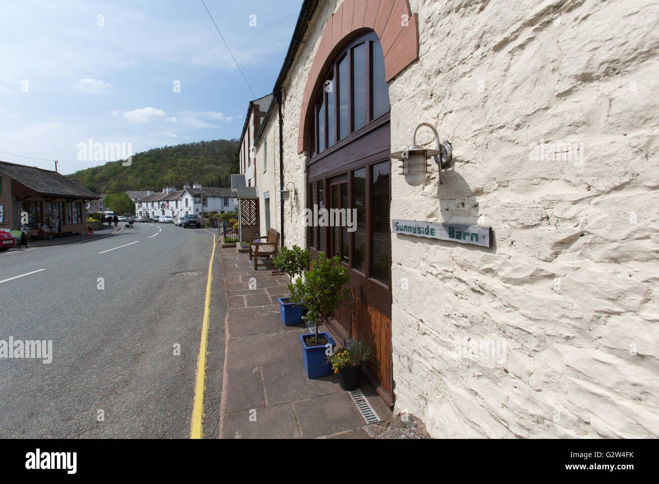 Pooley Bridge, England. Picturesque view of Pooley Bridge main street ...