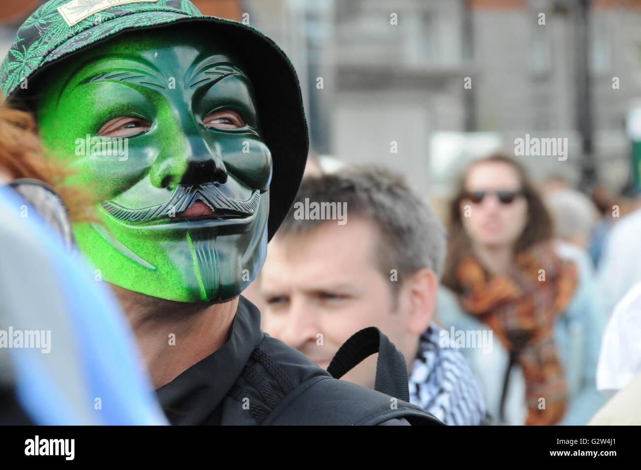 Masked protester at the 2015, Austerity protest on Westminster bridge ...
