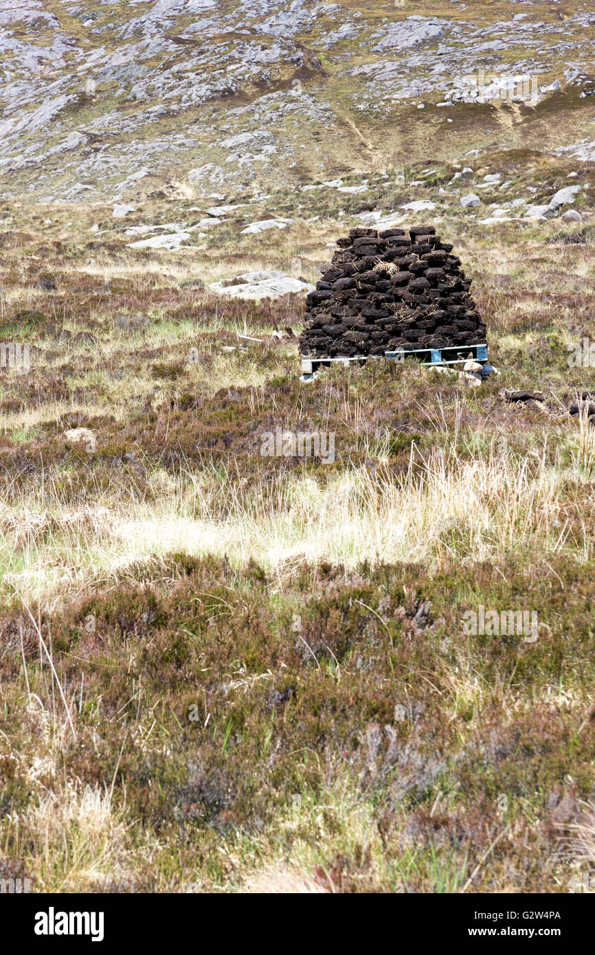 Stack of Peat drying out in summer Isle of Harris Western Isles ...