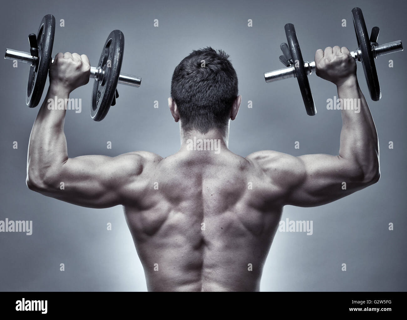 Man doing fitness exercise shoulders hi-res stock photography and ...