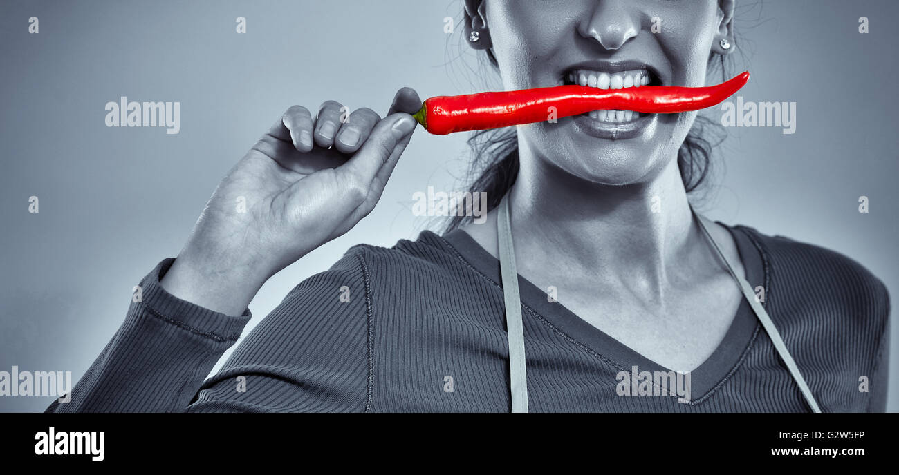 Biting a pepper hi-res stock photography and images - Alamy