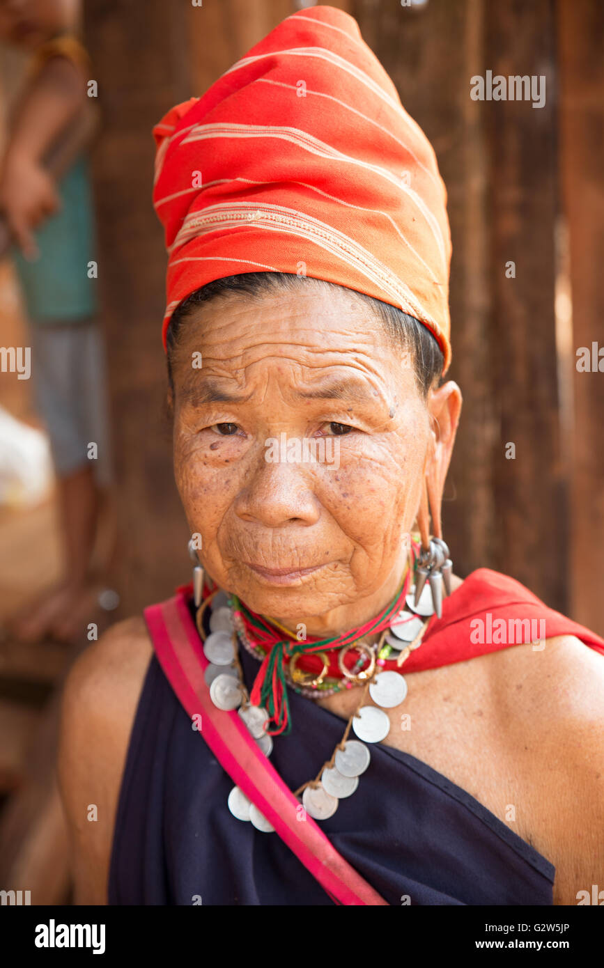 Portrait of a mature Kayah woman wearing traditional dress, Dawtamakyi ...