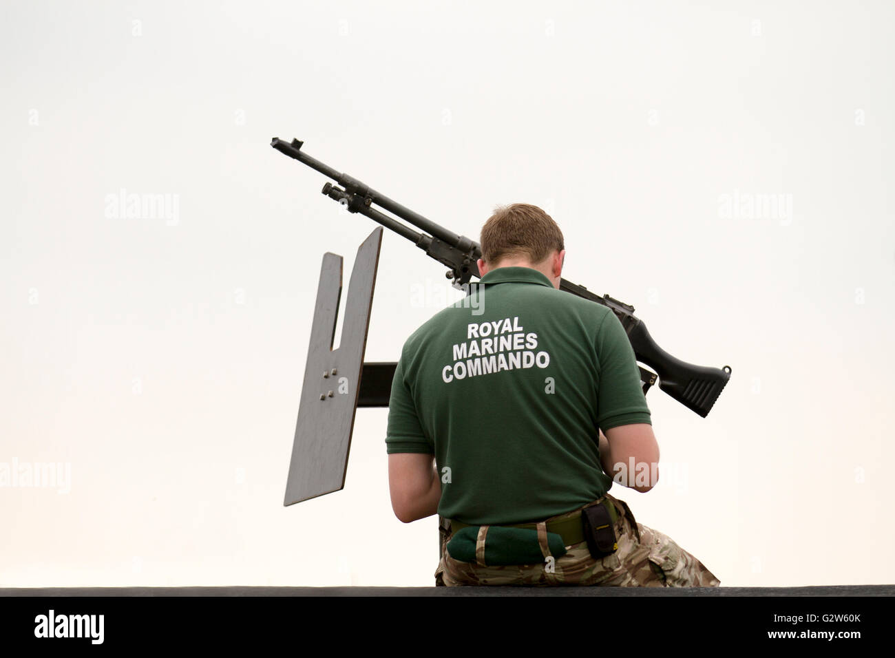 Armed British Royal Marines Commando with heavy weapon at the ...