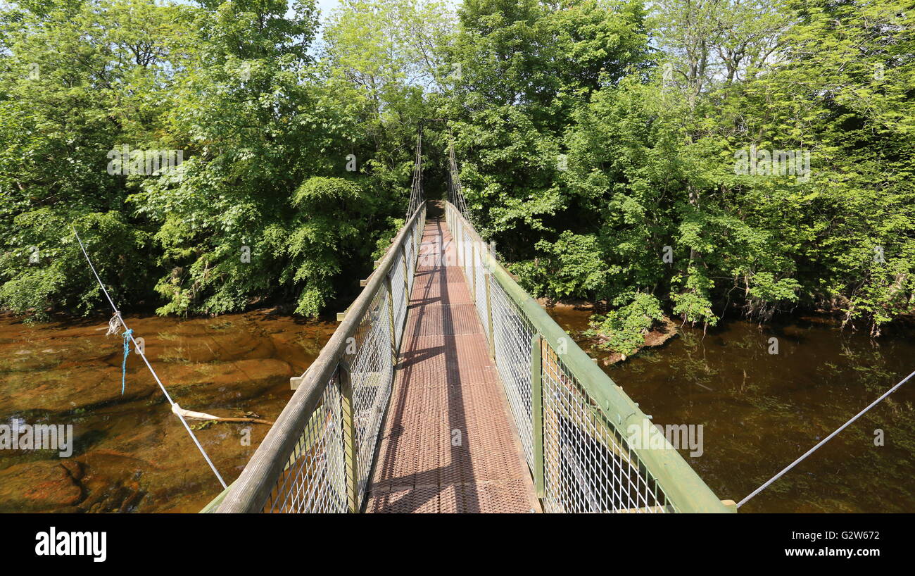 Suspension bridge over River North Esk near Edzell Angus Scotland June ...