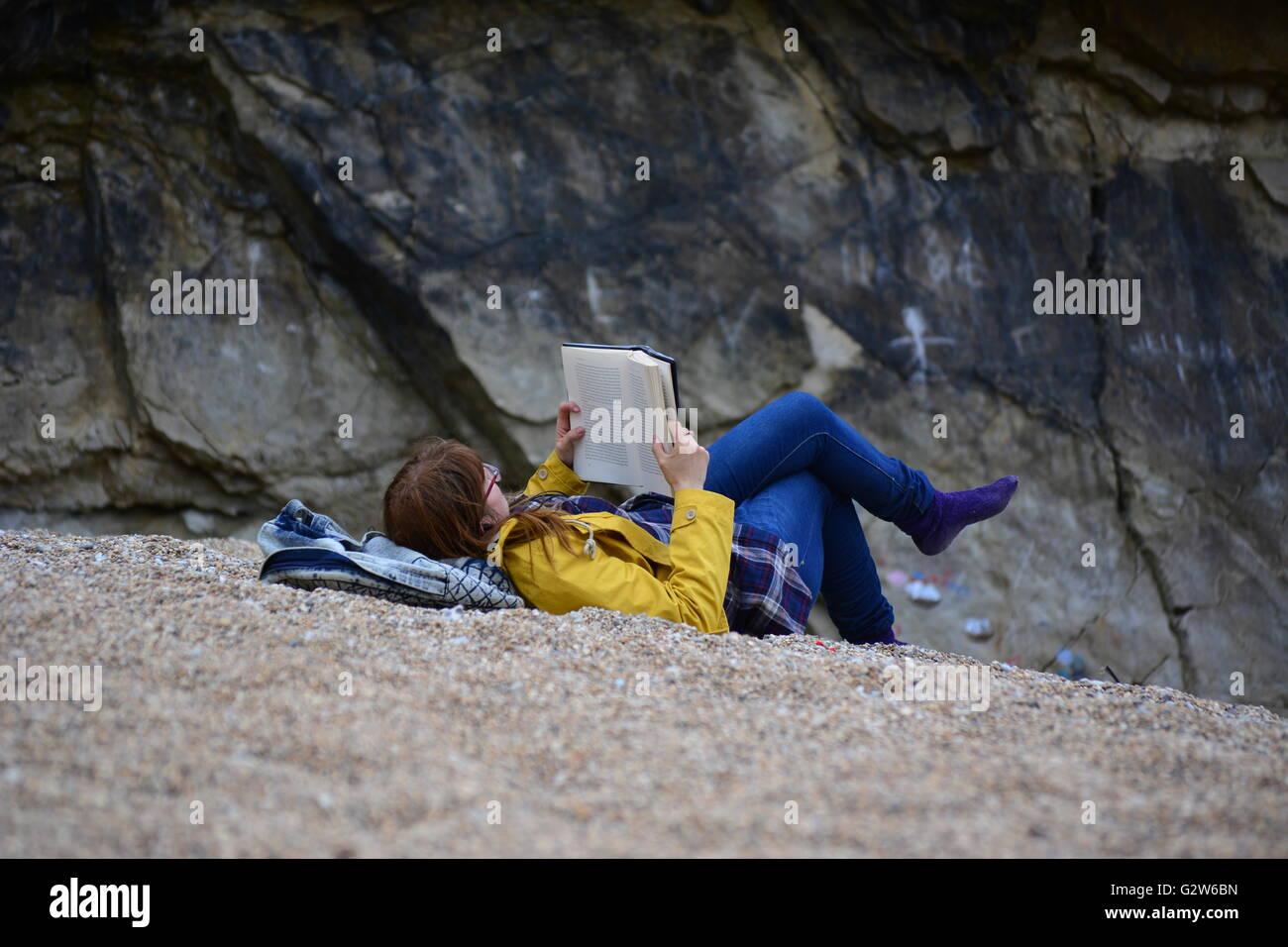 woman reading book on the beach Stock Photo - Alamy