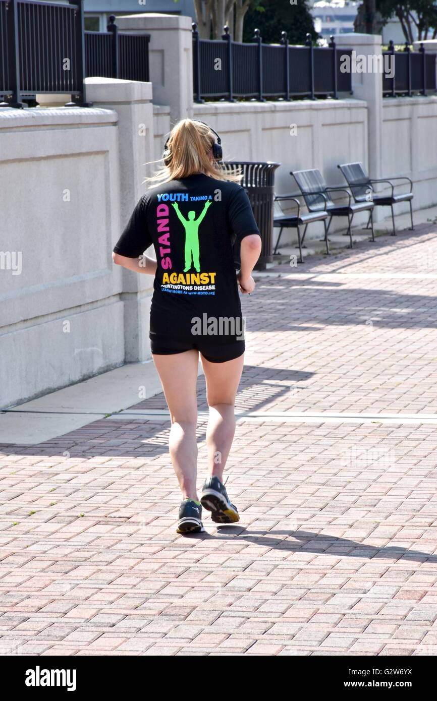 Running through street hi-res stock photography and images - Alamy