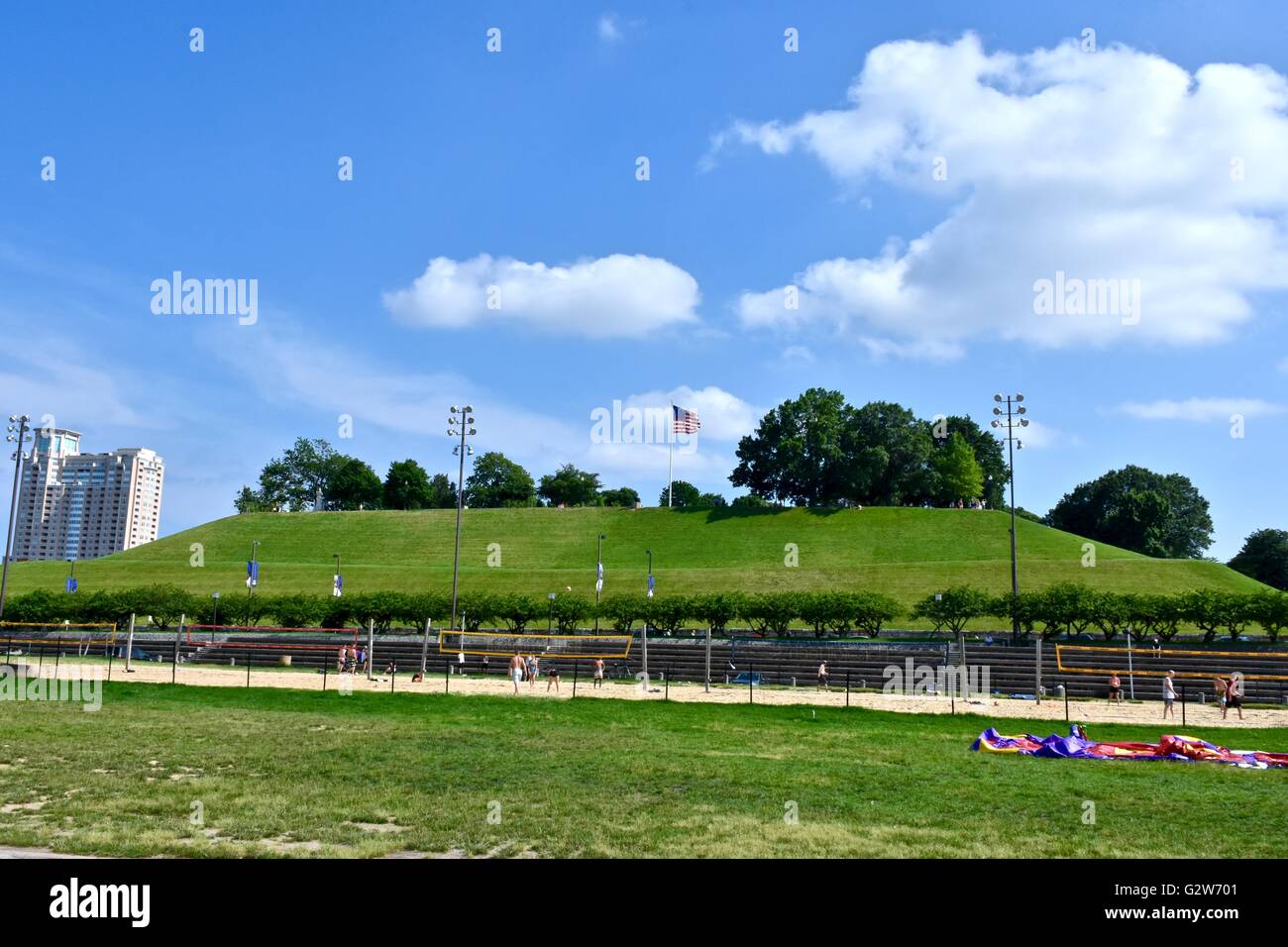 A United States flag stands tall on federal hill park near the ...