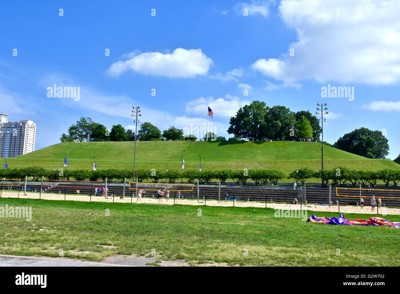 A United States flag stands tall on federal hill park near the ...