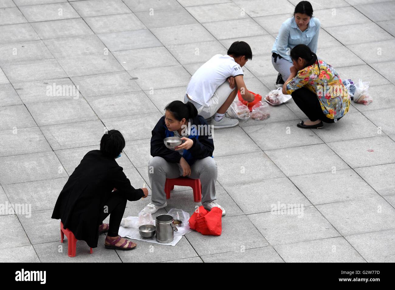 Zhengzhou, China's Henan Province. 2nd June, 2016. Students have lunch ...