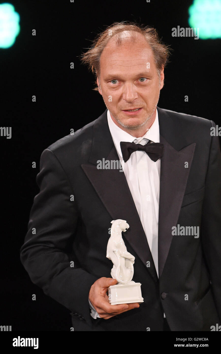 Munich, Germany. 3rd June, 2016. Actor Martin Brambach receiving the ...
