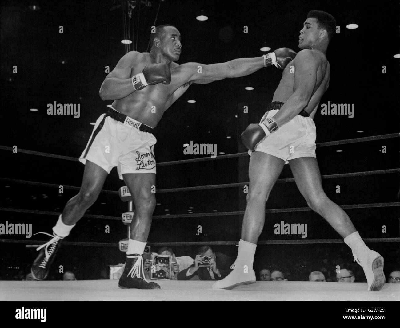 Cassius Clay (r) avoids Charles "Sonny" Liston's left during the ...