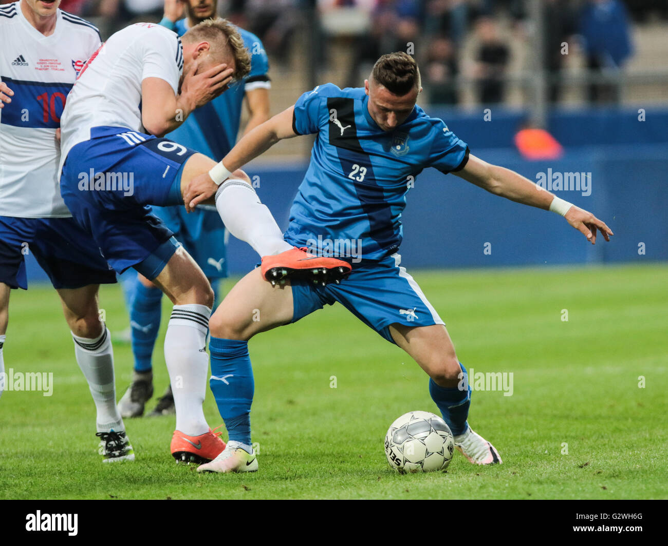 Gilli Rolantsson (l) of the Faroe Islands and Bernard Berisha of Kosovo ...