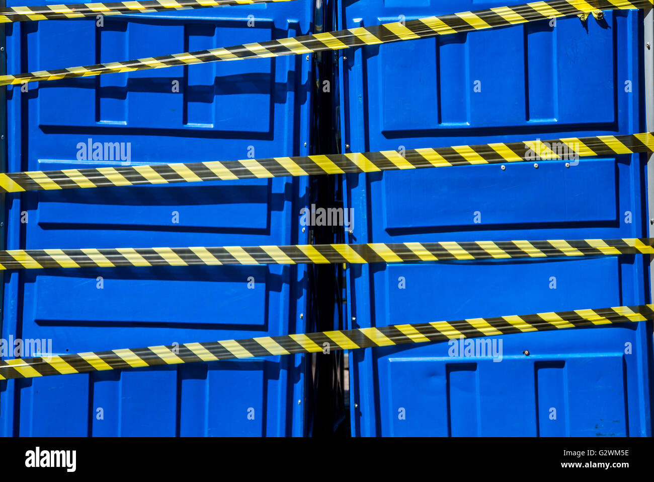 Blue boxes bound by tape Stock Photo - Alamy