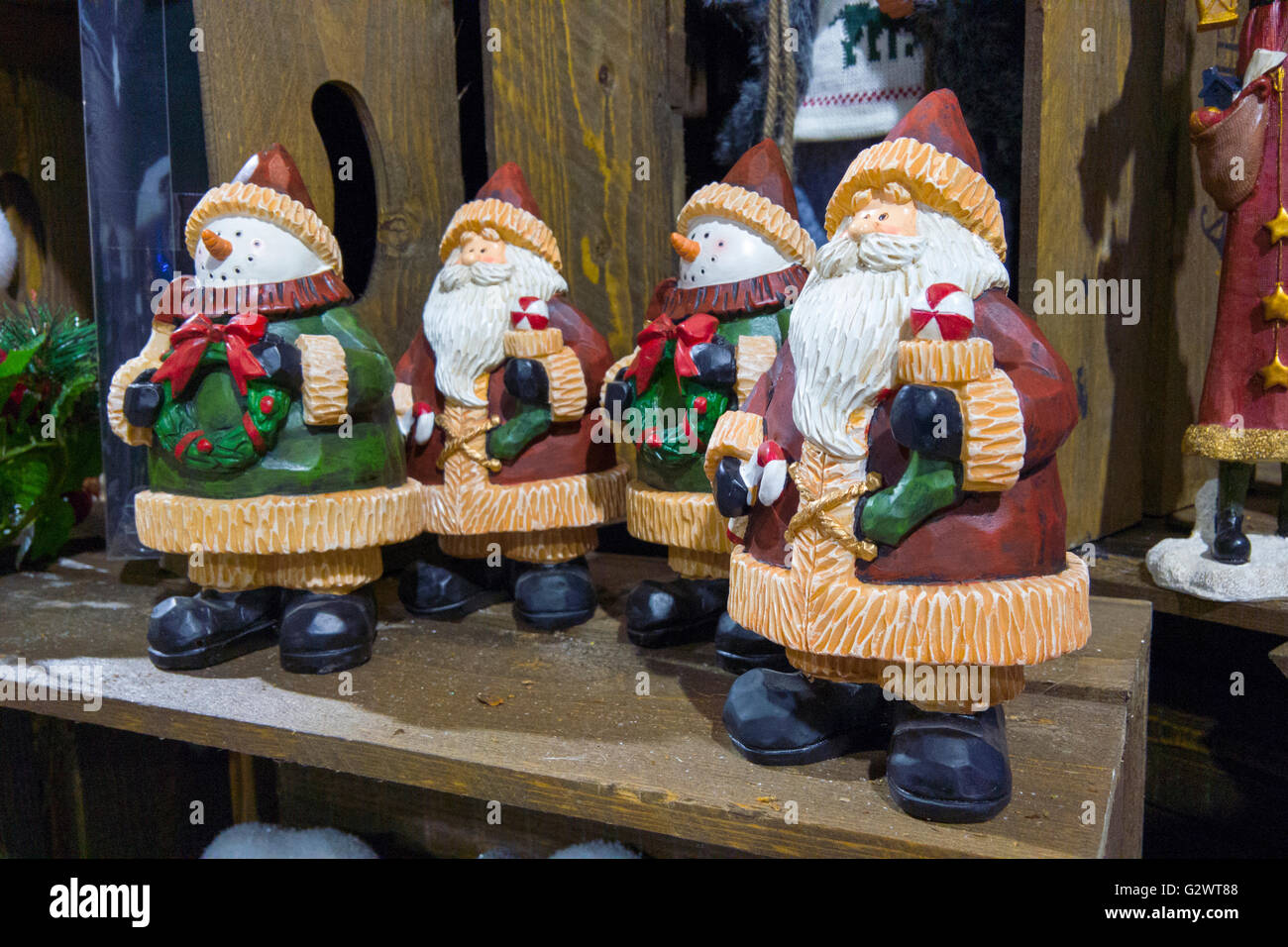 Decorative Santa Clauses on display at a garden centre Stock Photo - Alamy