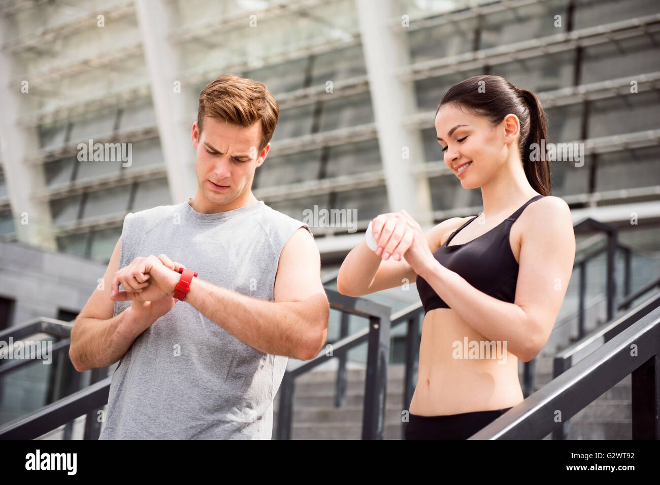 Man woman smile watch hi-res stock photography and images - Alamy