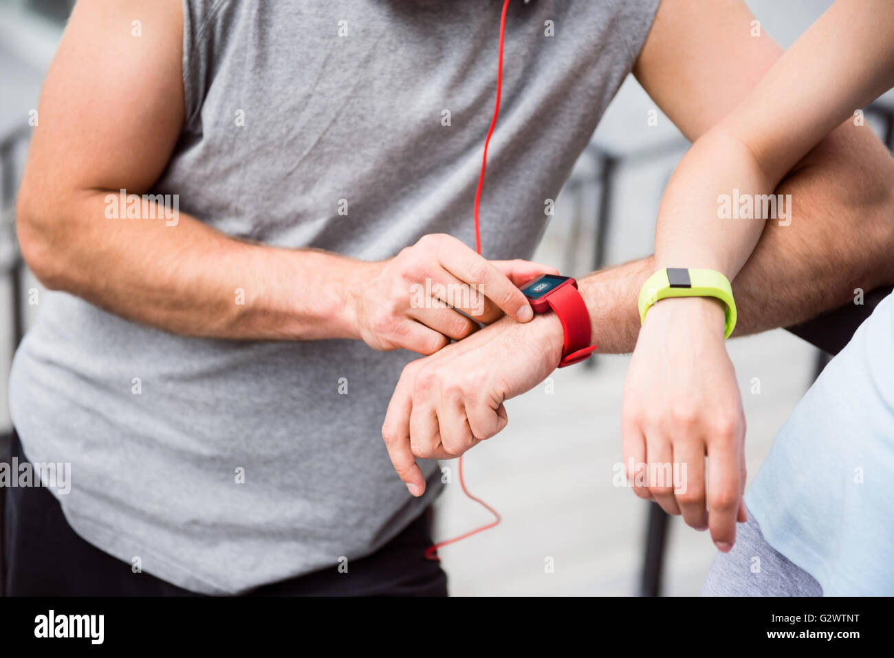 Hands of man and woman with watches Stock Photo - Alamy