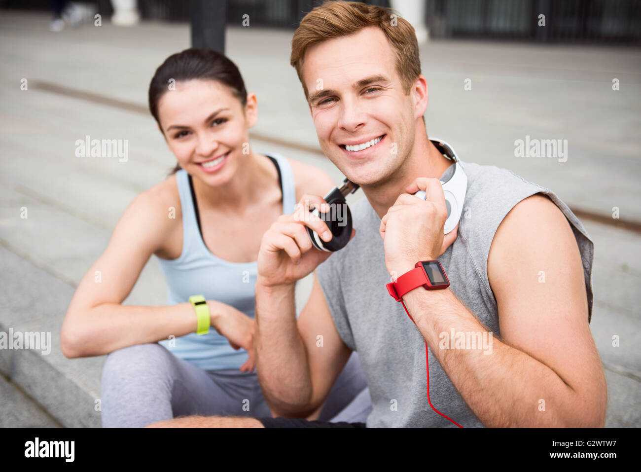 Man and woman looking at the camera Stock Photo - Alamy
