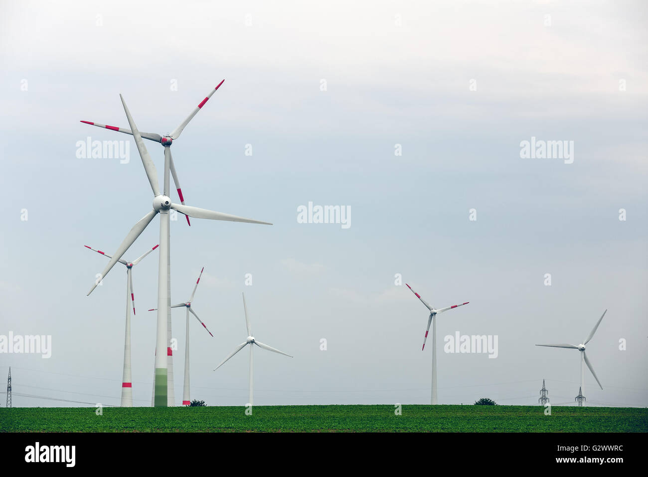 Ecological power with windmill on the field Stock Photo - Alamy