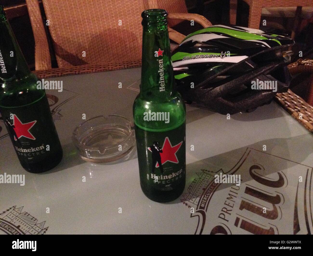 Beer break and bicycle Helmet Stock Photo - Alamy