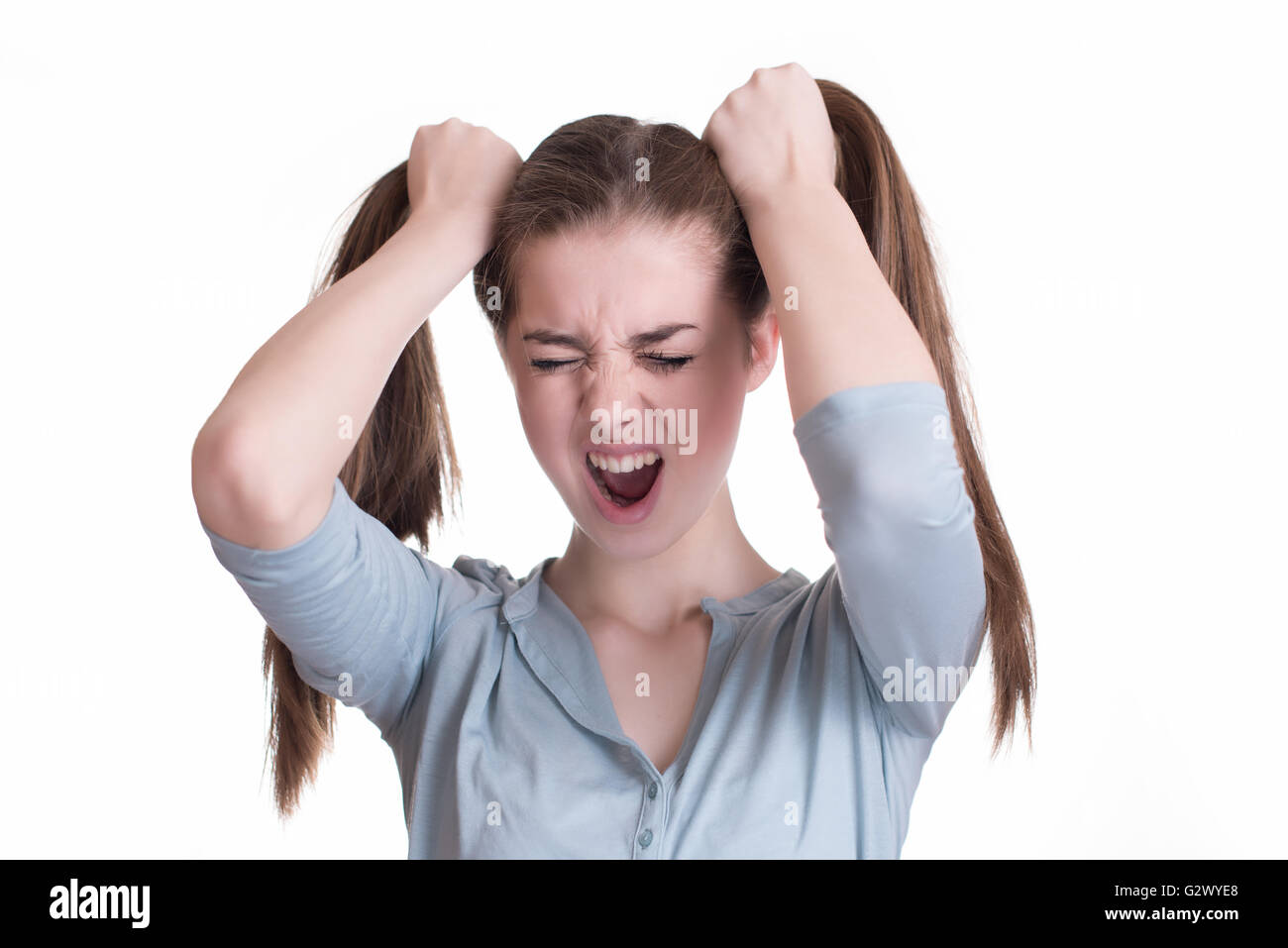 Portrait of stressed young girl Stock Photo - Alamy
