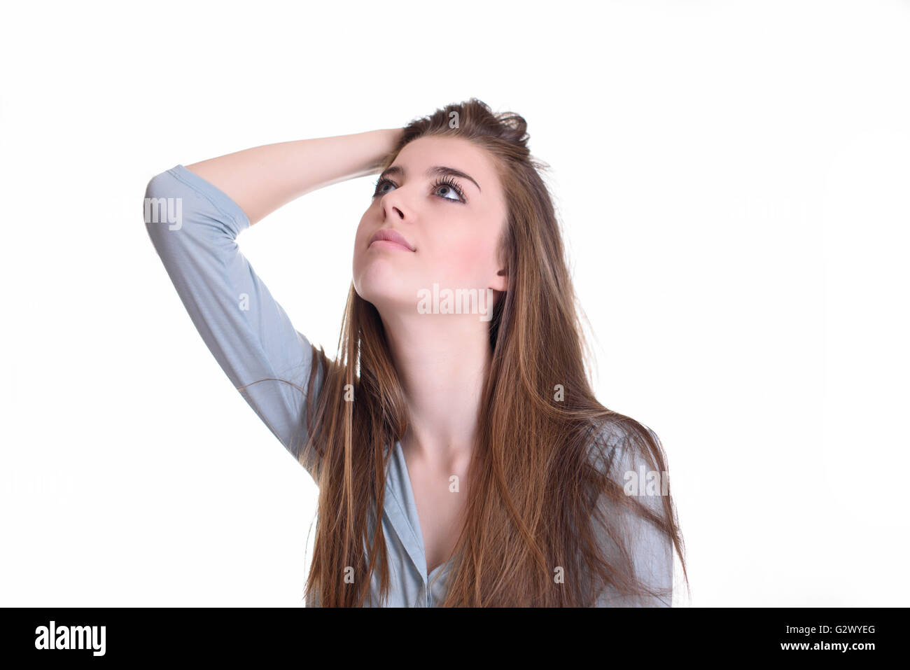 Confused young woman Stock Photo - Alamy