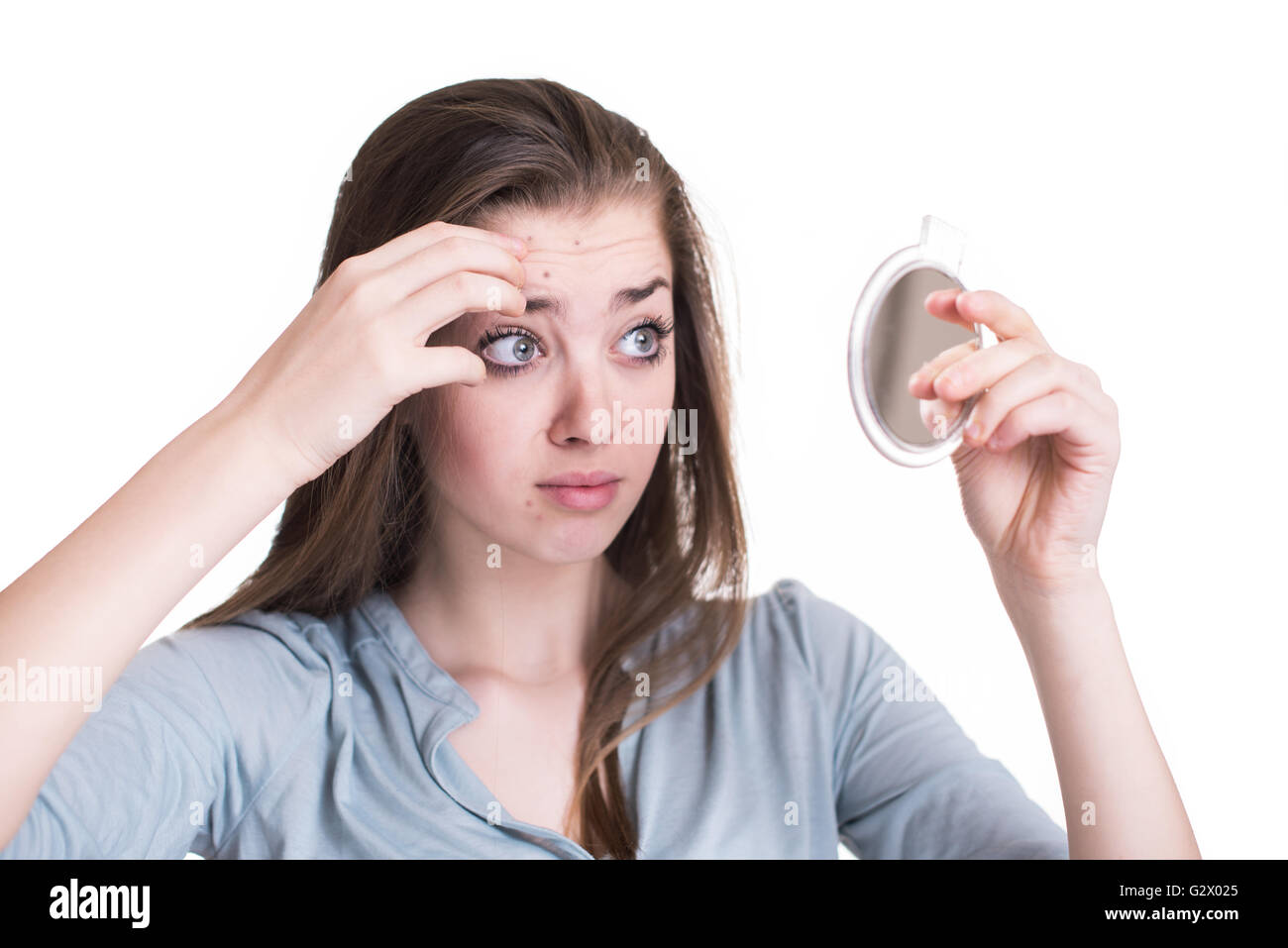 Young woman unhappy touch her skin Stock Photo - Alamy