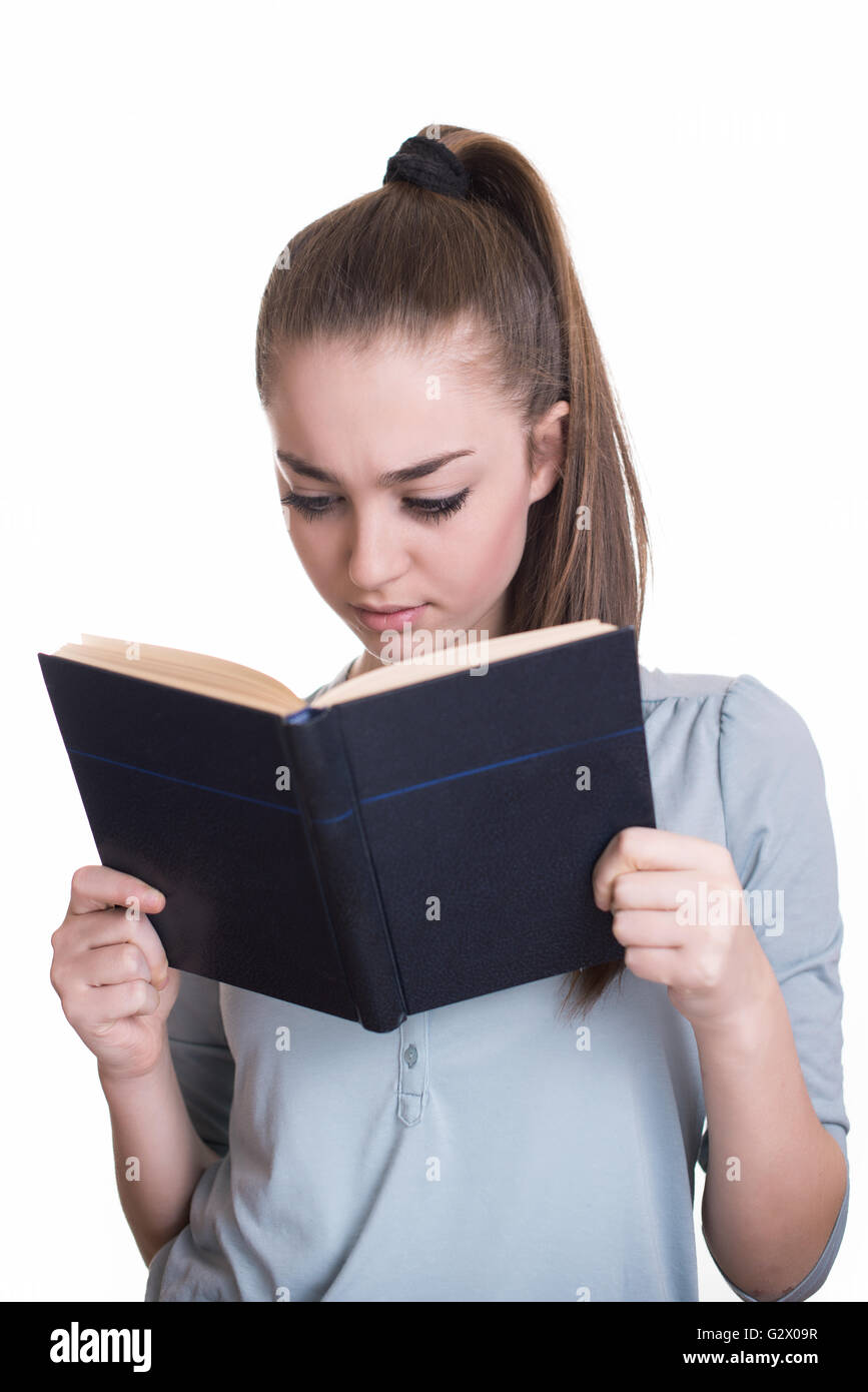 young beautiful girl reading a book Stock Photo - Alamy